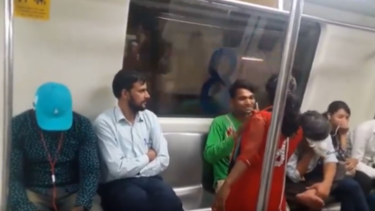 Just Delhi Metro things! Woman slaps man with chappal, he slaps her ...